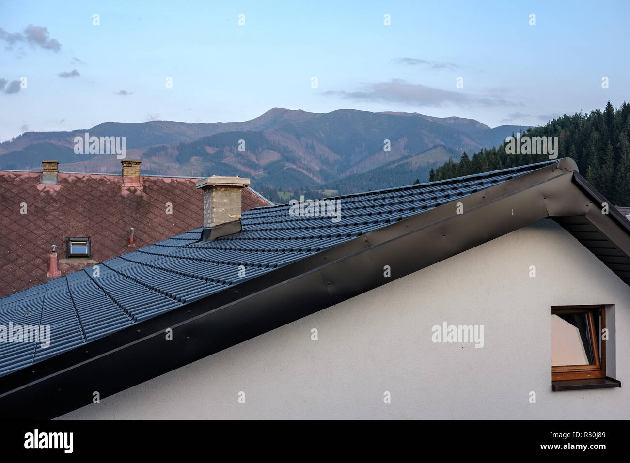 country village rooftops in Slovakia with mountains in background Stock ...