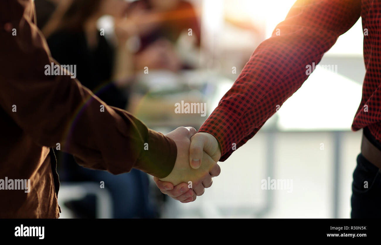closeup of handshake between two men i Stock Photo - Alamy