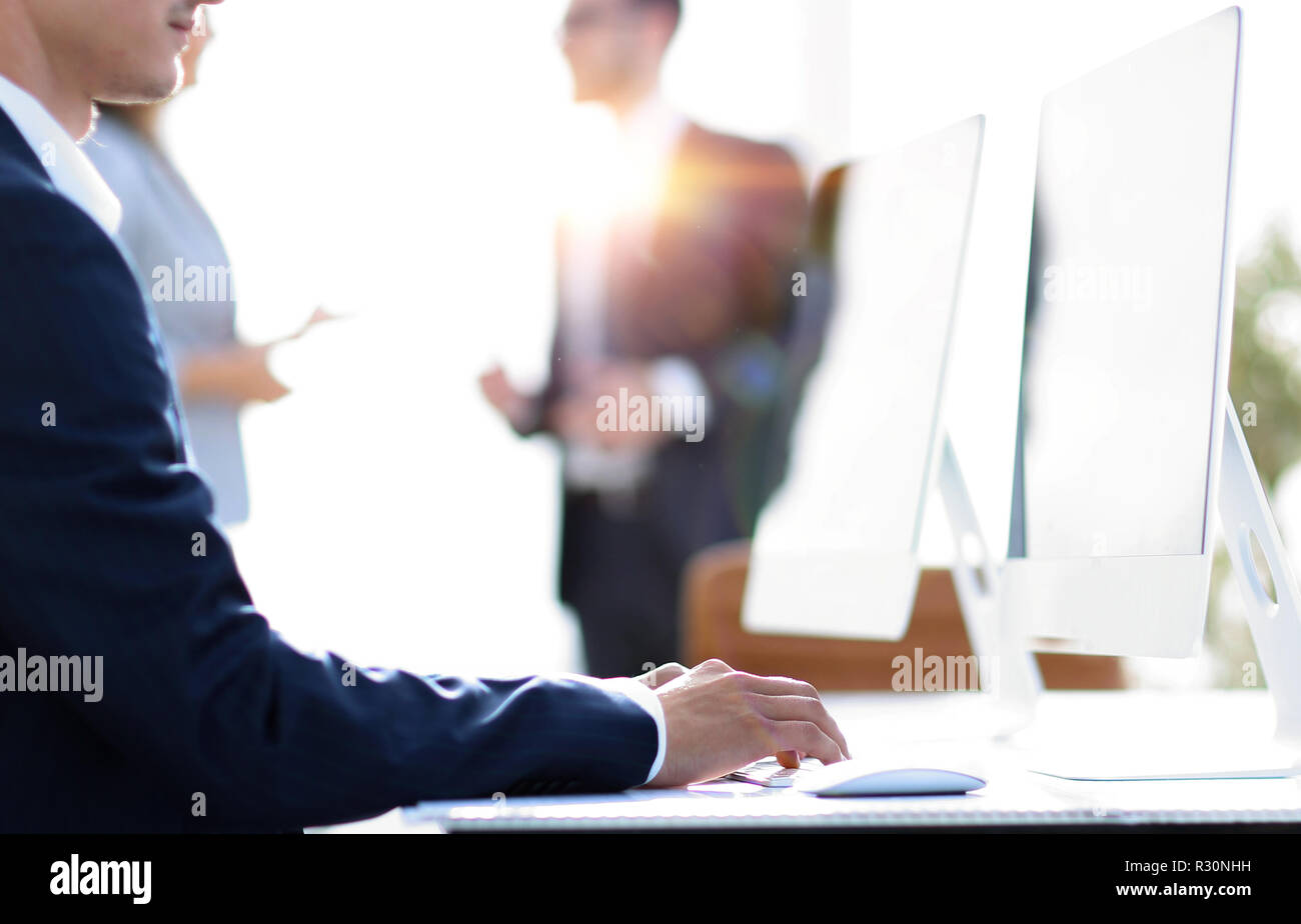 employee is typing on the computer keyboard Stock Photo - Alamy