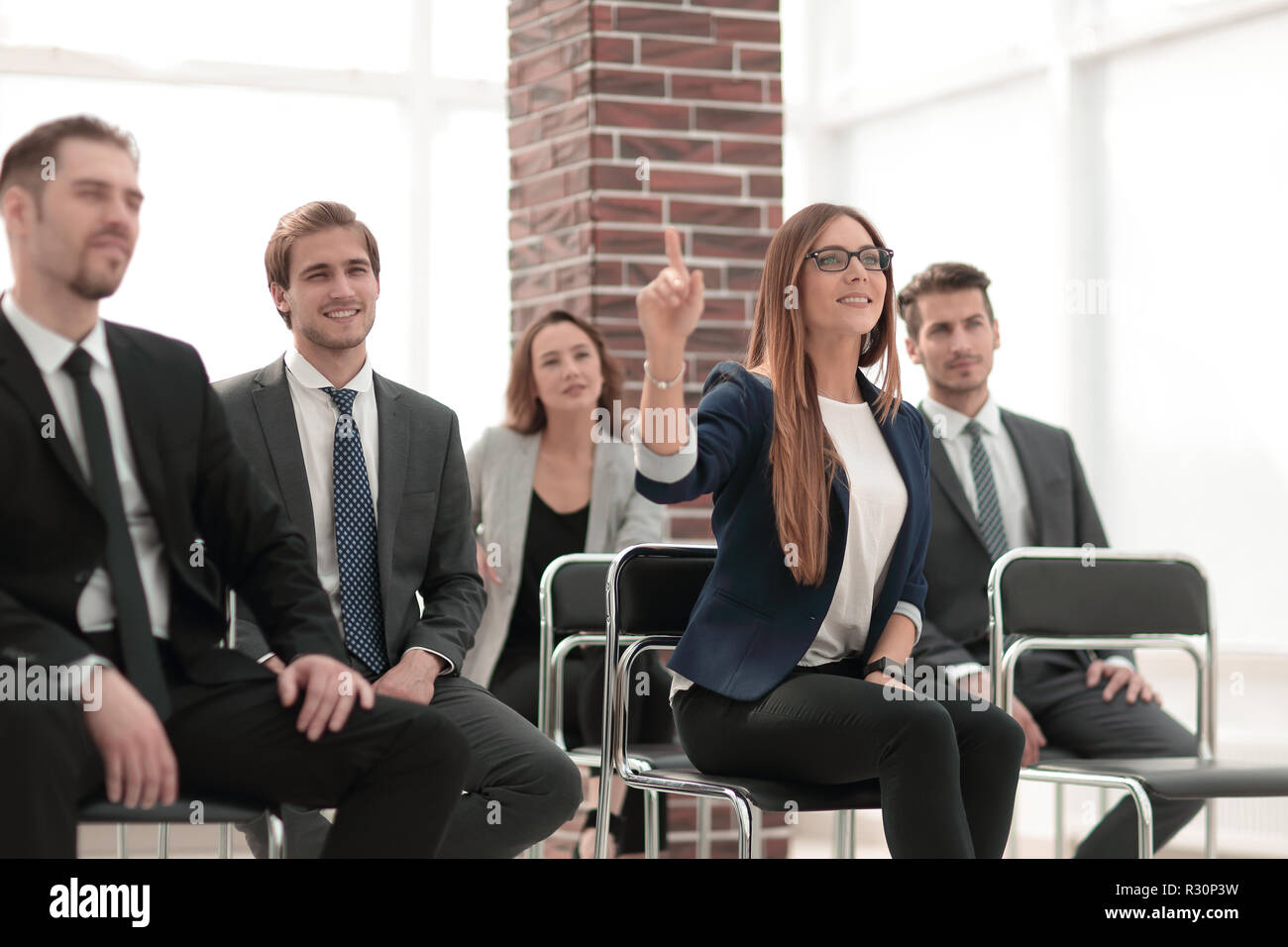 Interested woman asking for questions Stock Photo - Alamy