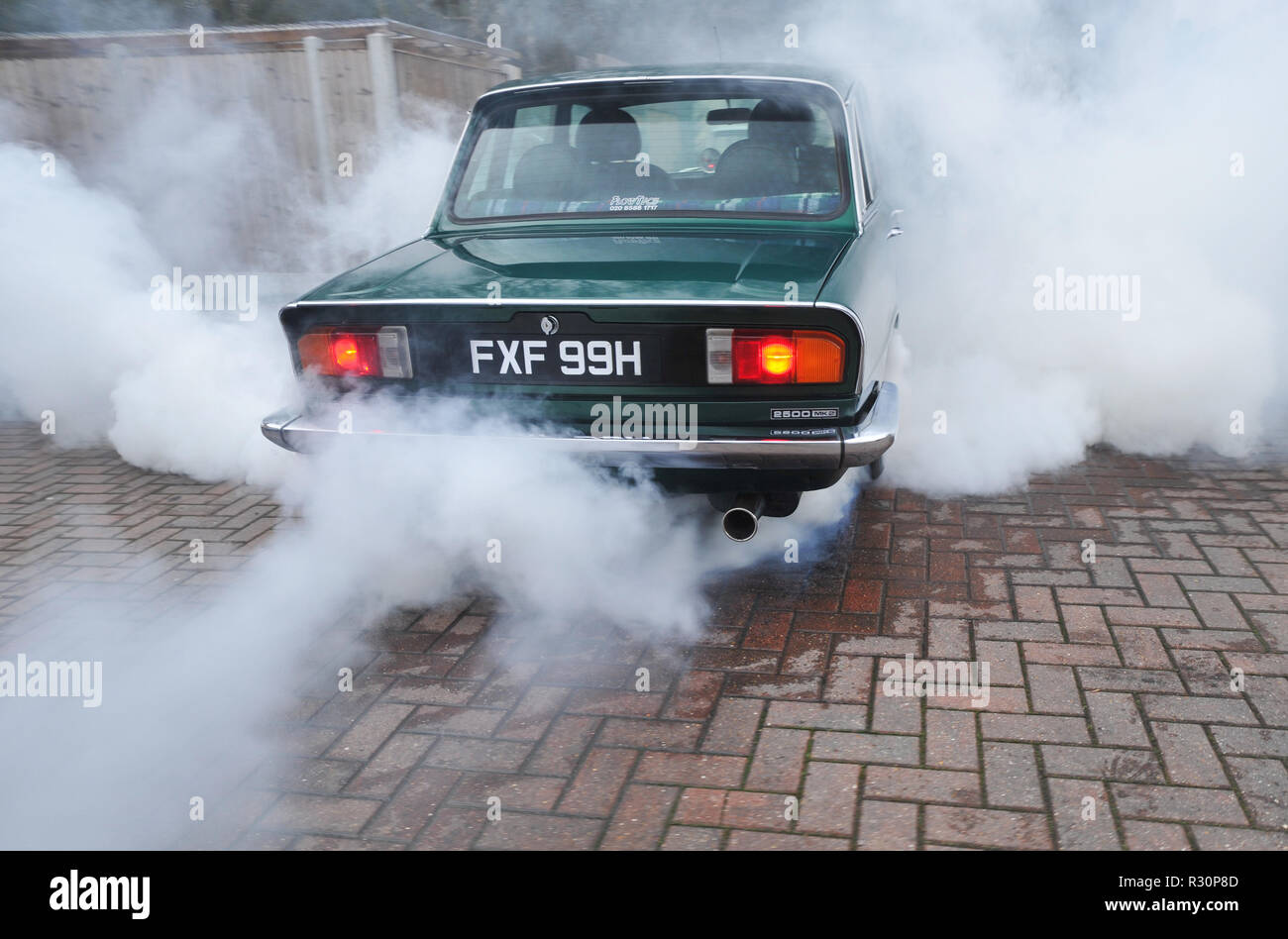 burnout wheelsman by a Triumph 2500 classic 1970s British saloon car ...