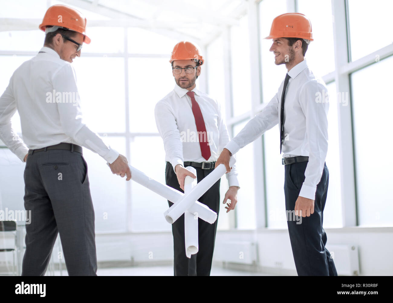 three architects crossed their designs Stock Photo - Alamy