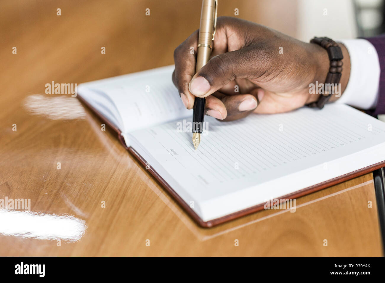 African american man signing contract, black man hand putting signature ...