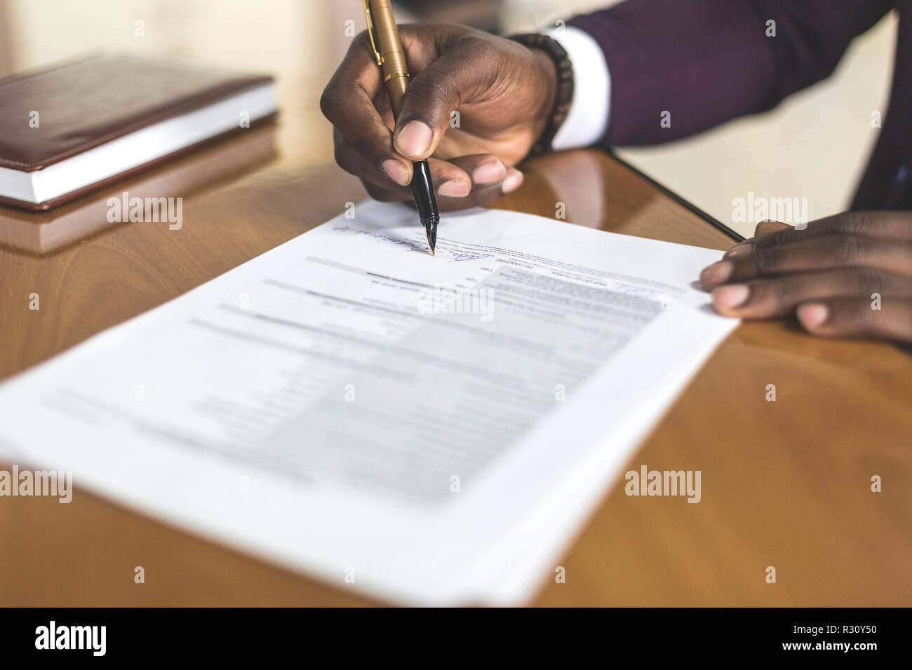 African american man signing contract, black man hand putting signature ...