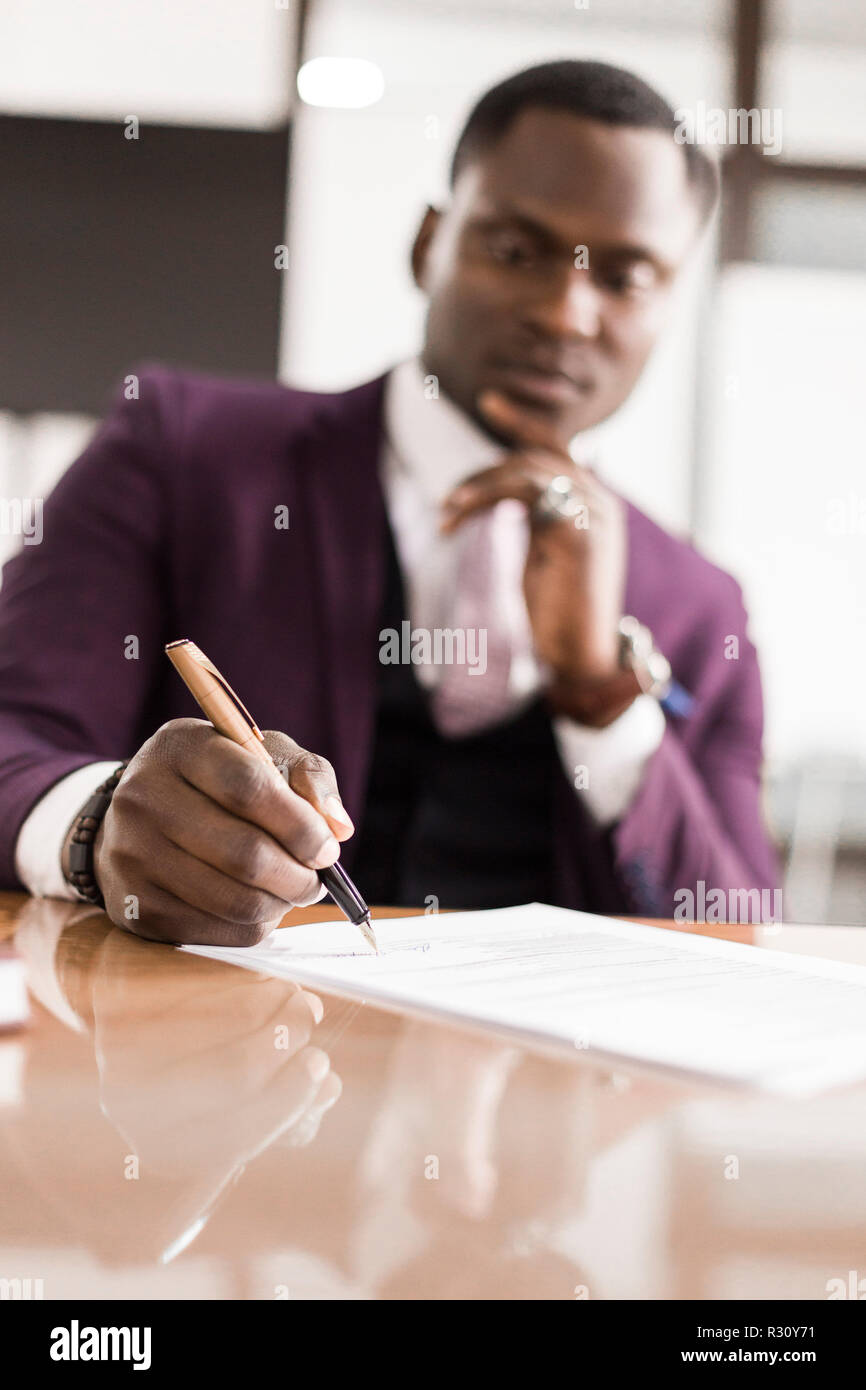 African american man signing contract, black man hand putting signature ...