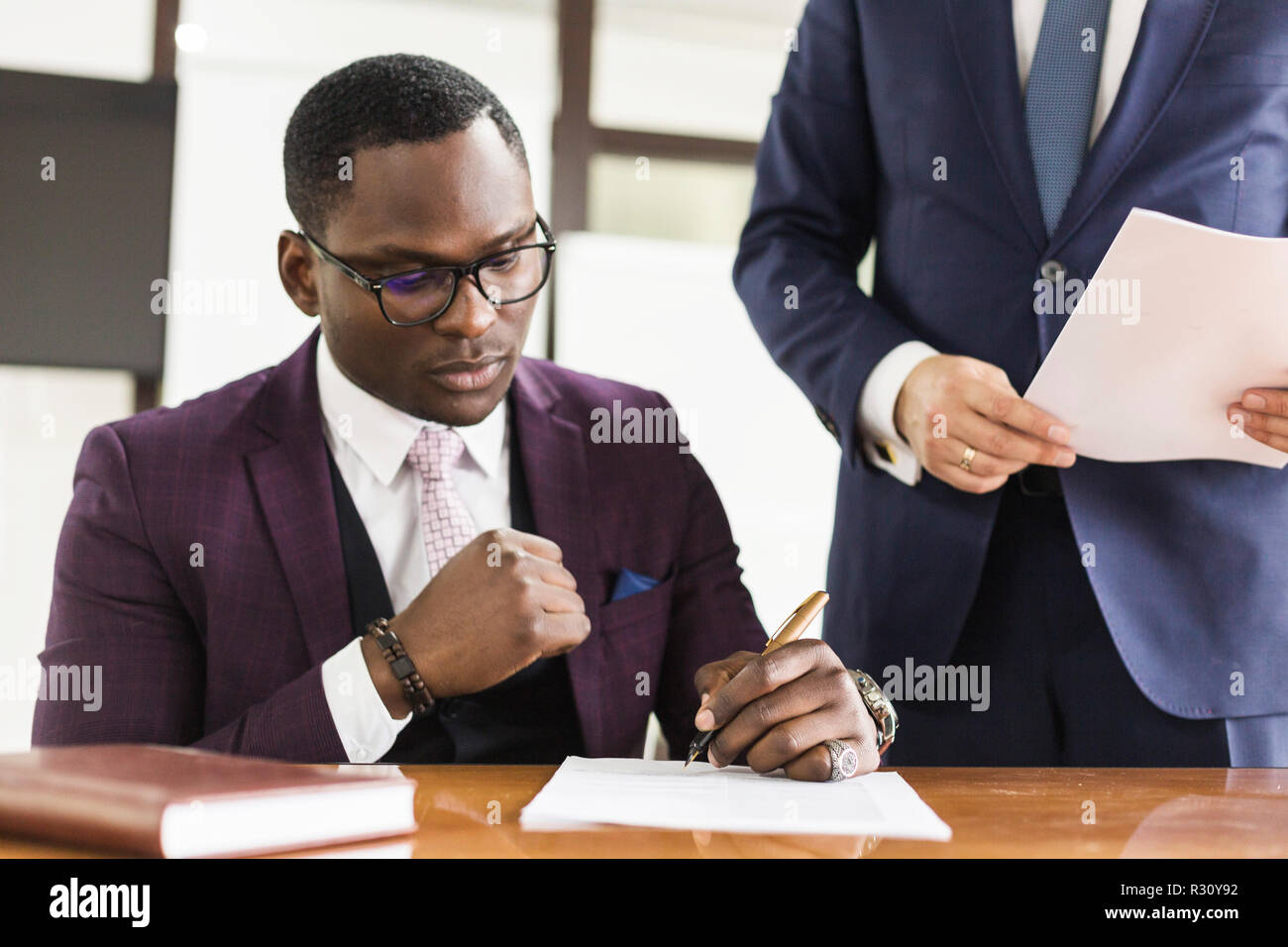 African american man signing contract, black man hand putting signature ...