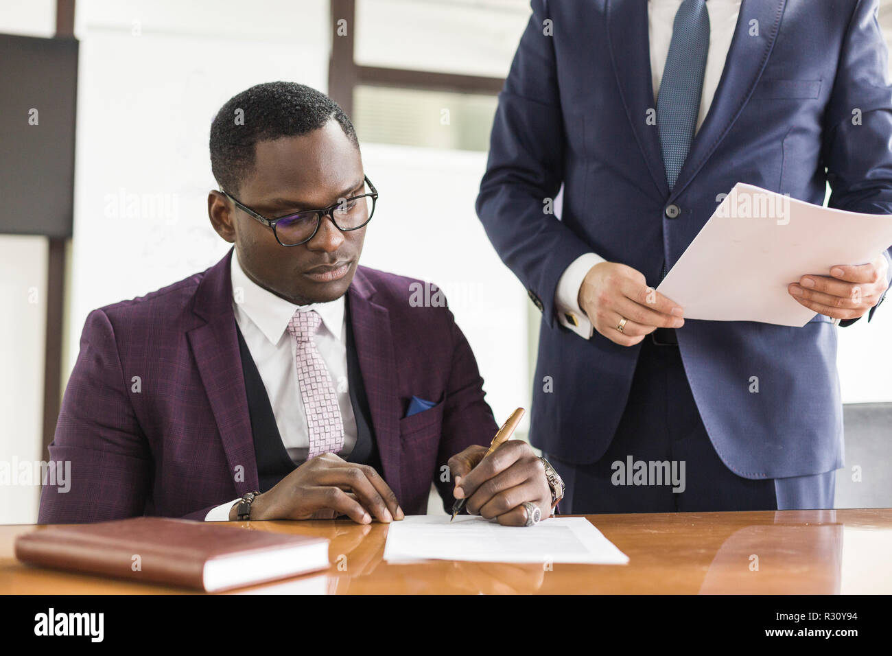 African american man signing contract, black man hand putting signature ...