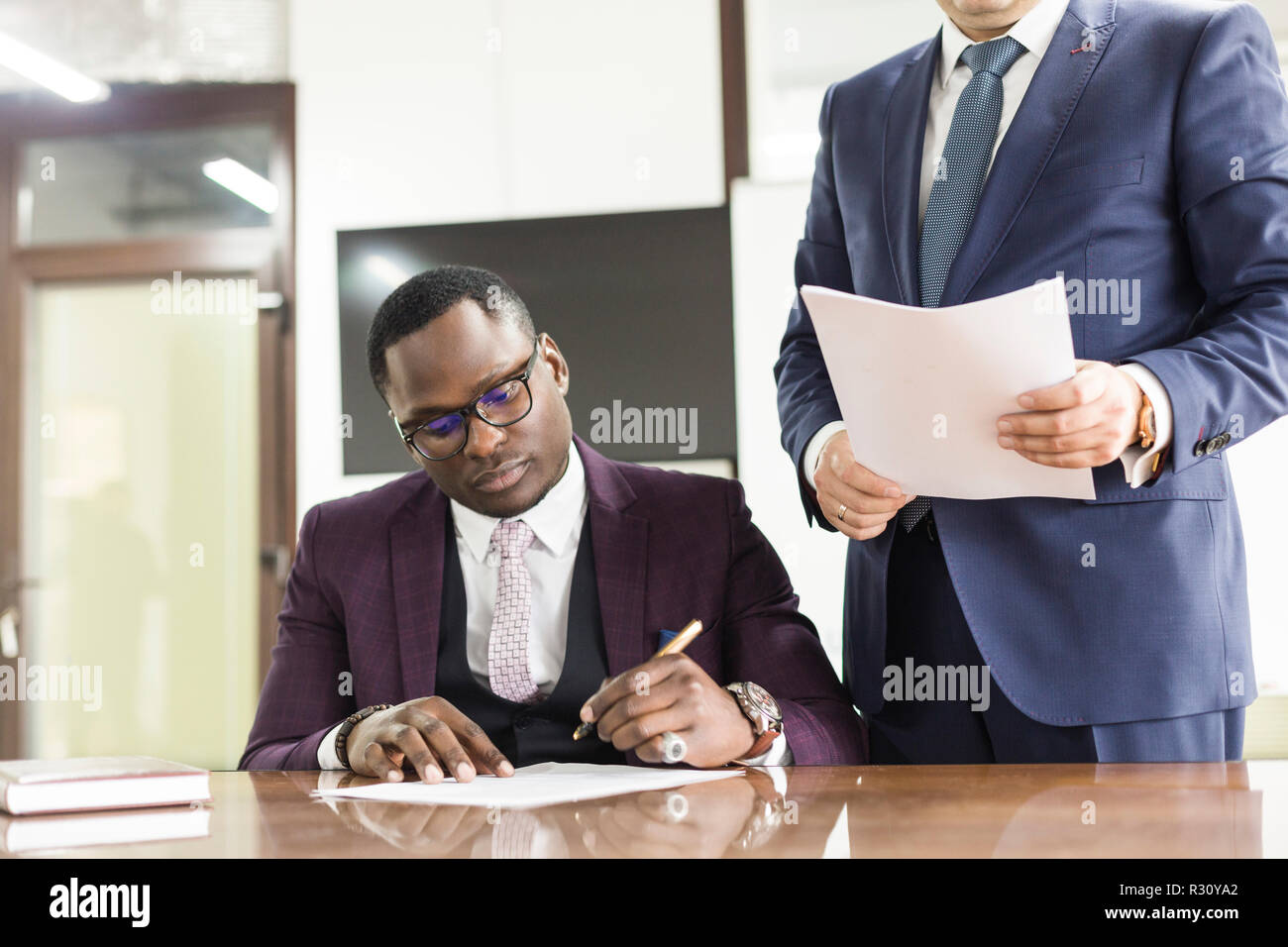 African american man signing contract, black man hand putting signature ...