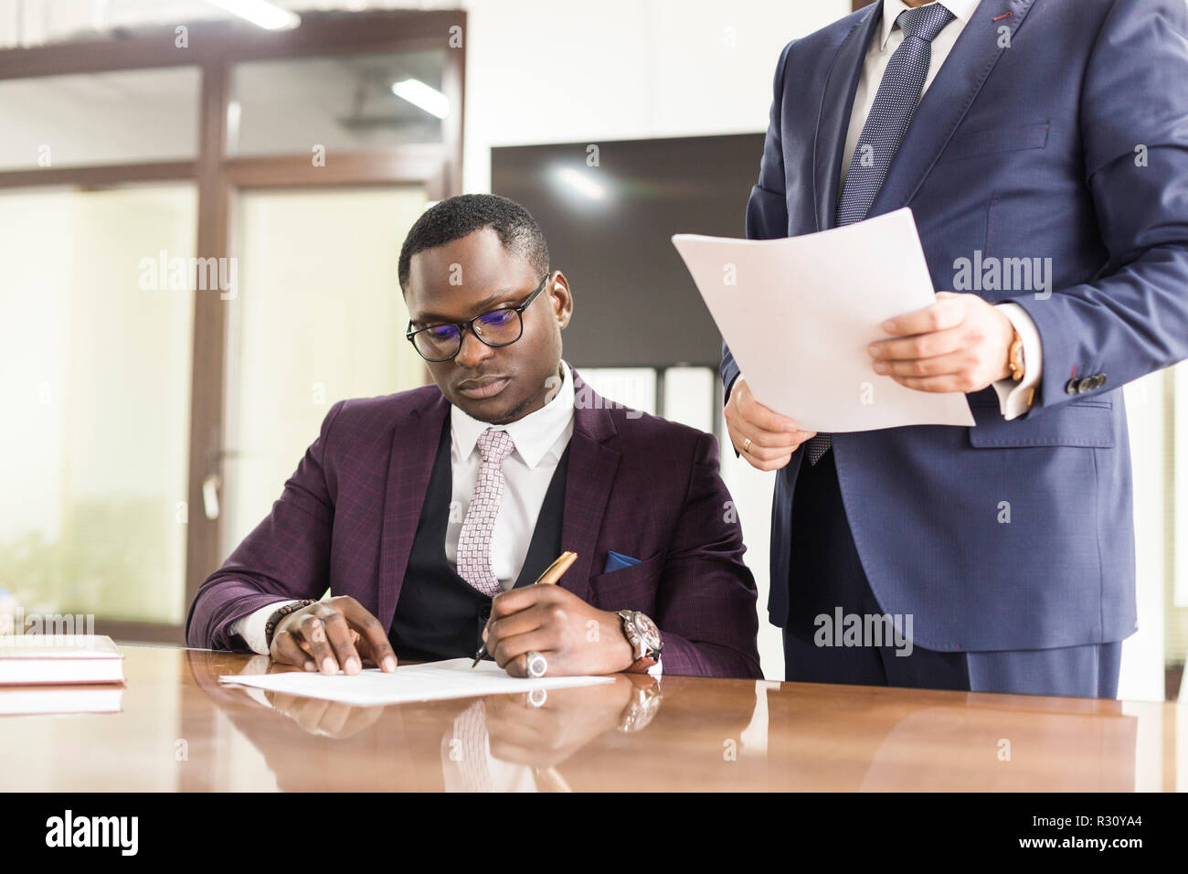 African american man signing contract, black man hand putting signature ...