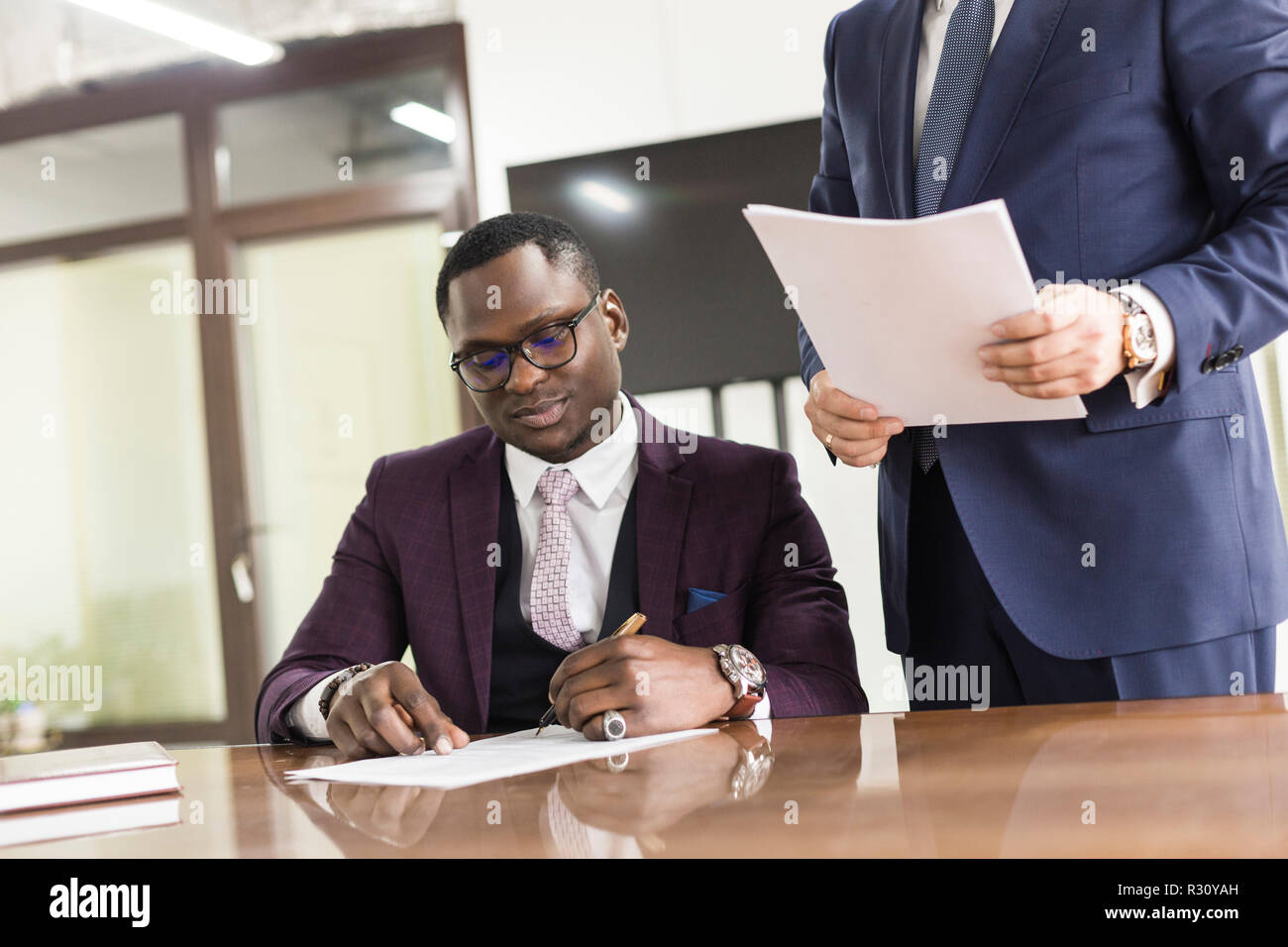 African american man signing contract, black man hand putting signature ...