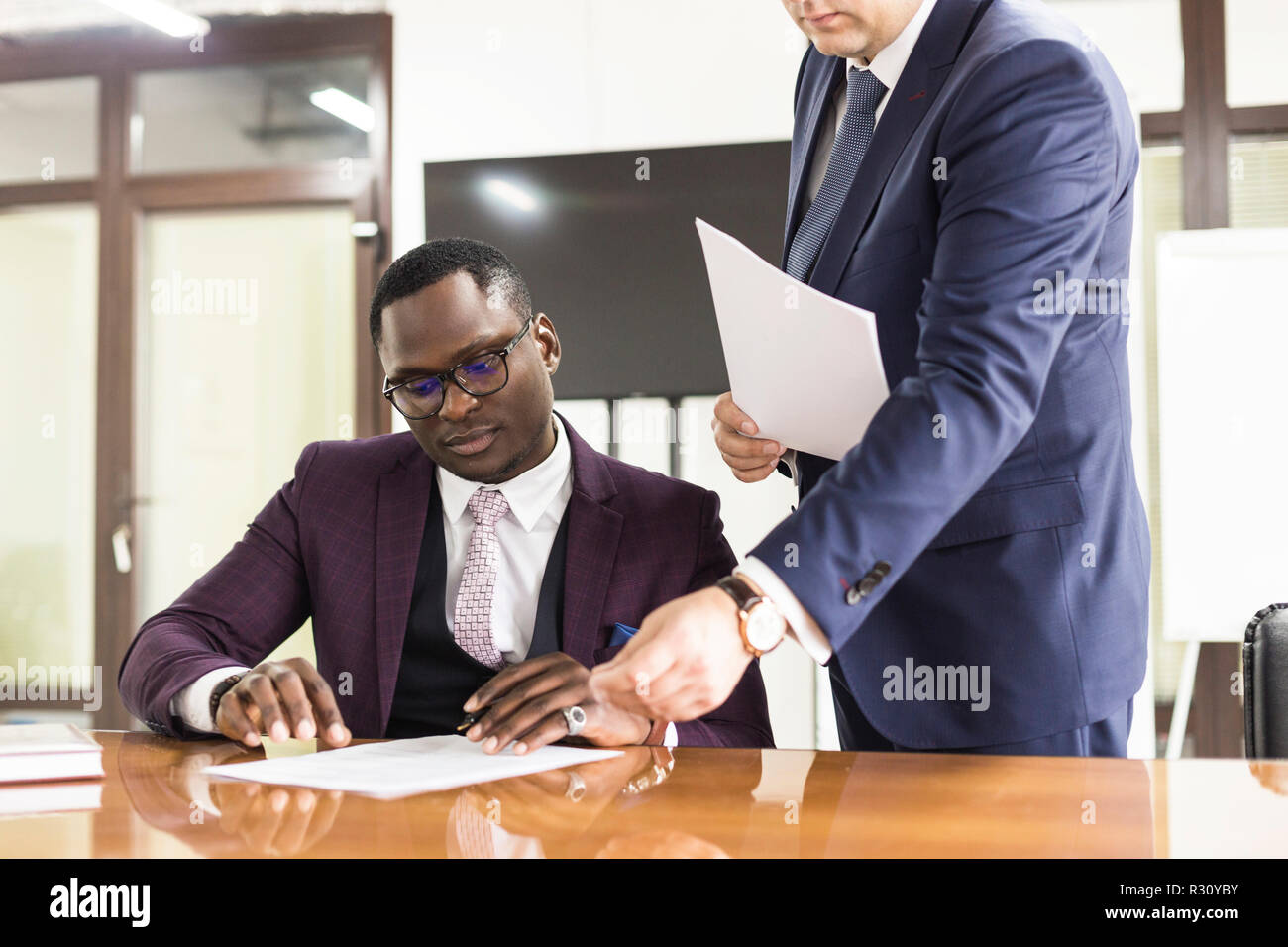 African american man signing contract, black man hand putting signature ...