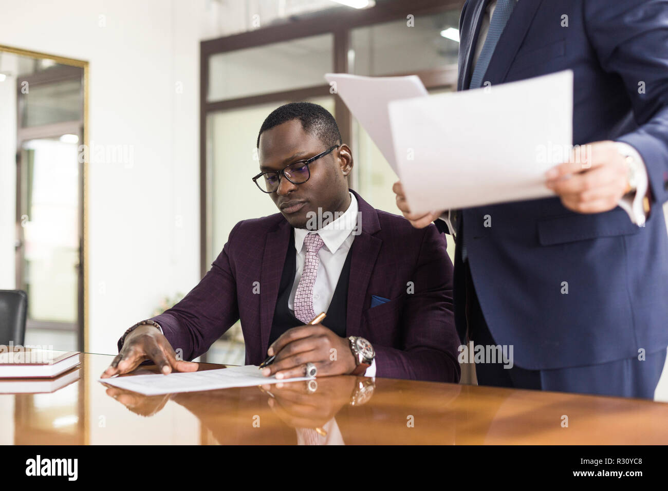 African american man signing contract, black man hand putting signature ...