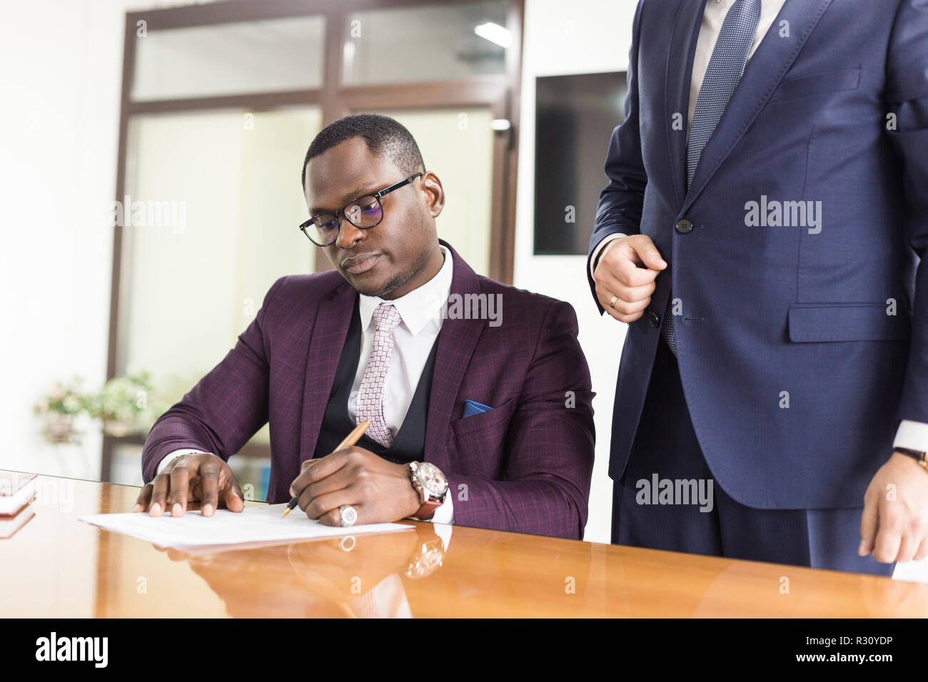 African american man signing contract, black man hand putting signature ...