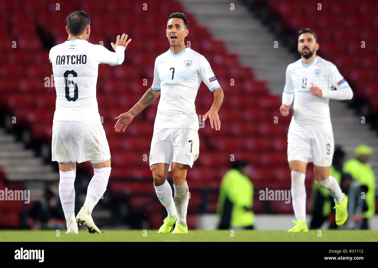 Israel's Eran Zehavi (centre) celebrates scoring his side's second goal ...