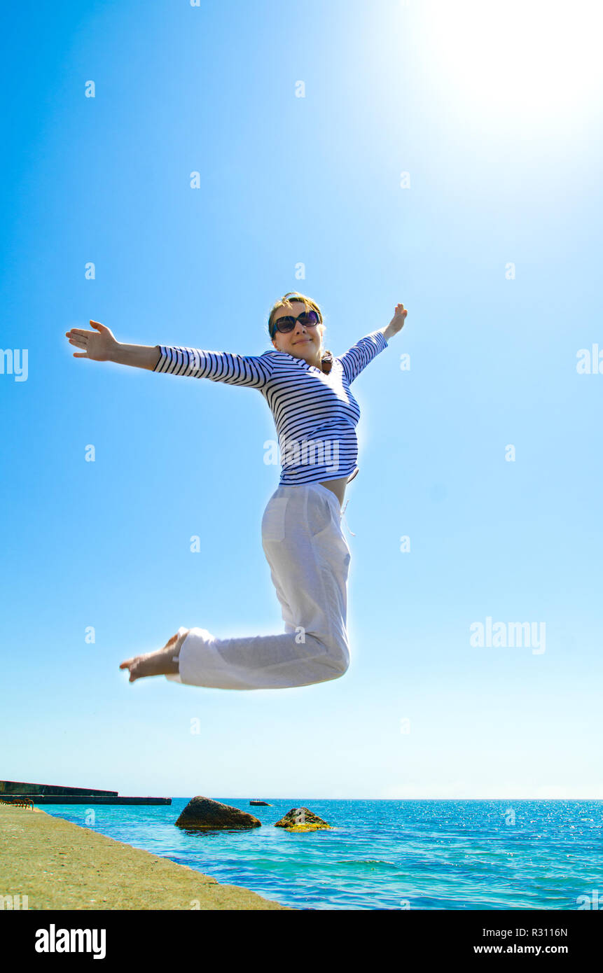 Sea woman jumping hi-res stock photography and images - Alamy