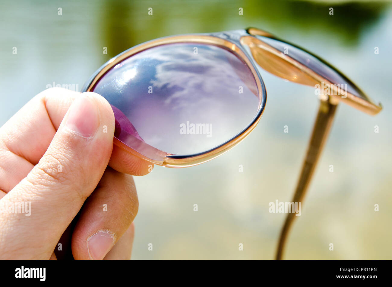 Hand with glasses hi-res stock photography and images - Alamy