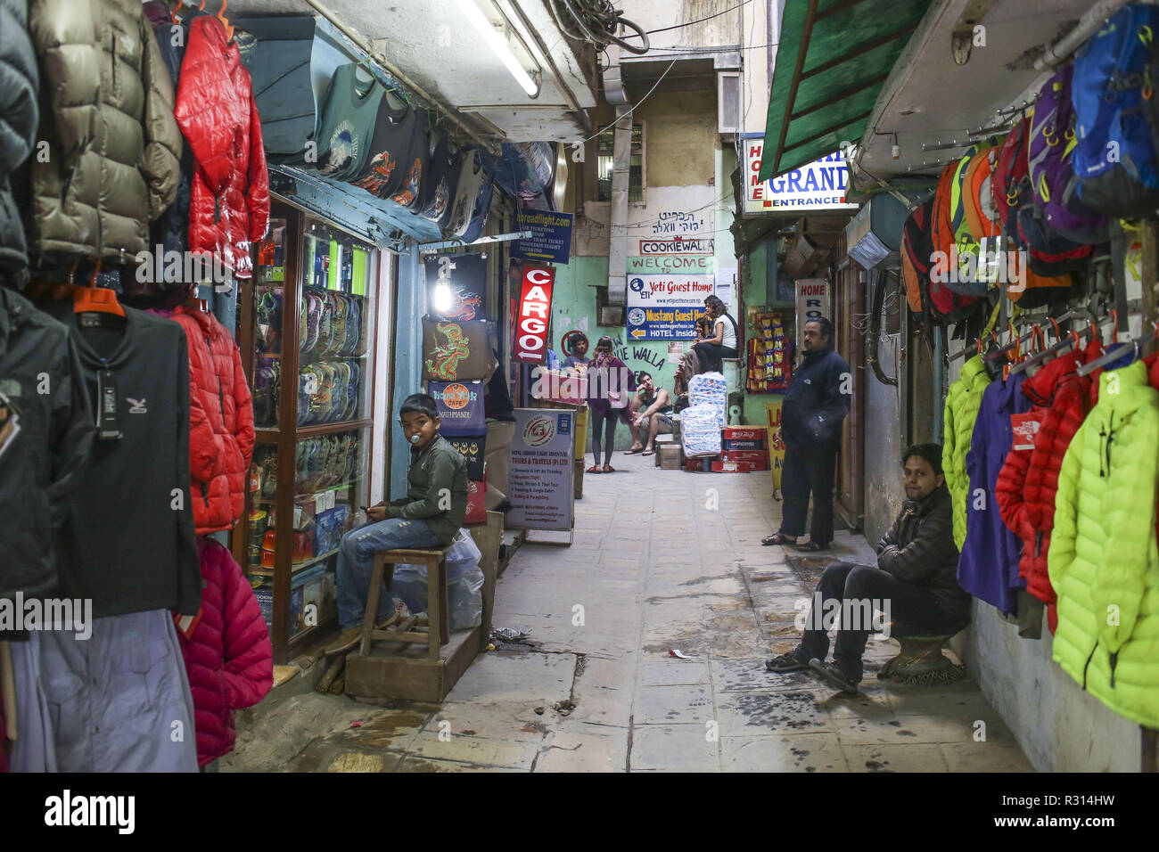 Kathmandu, Nepal. 3rd Apr, 2015. Shop attendants seen seating at their ...