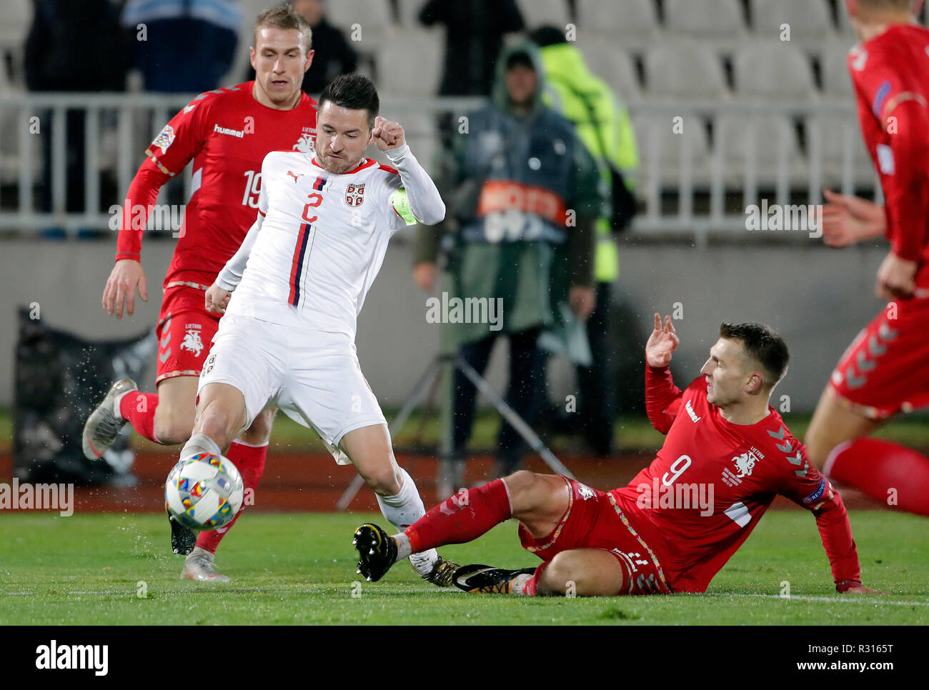 Belgrade. 20th Nov, 2018. Serbia's Antonio Rukavina (C) vies with ...