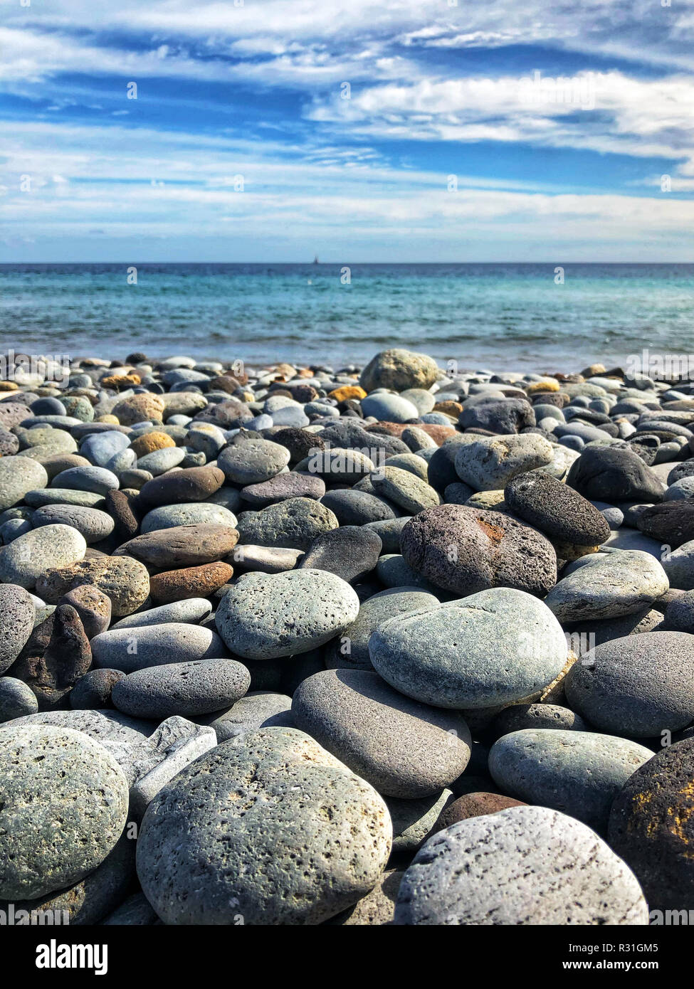 Wet sea pebble stone hi-res stock photography and images - Alamy