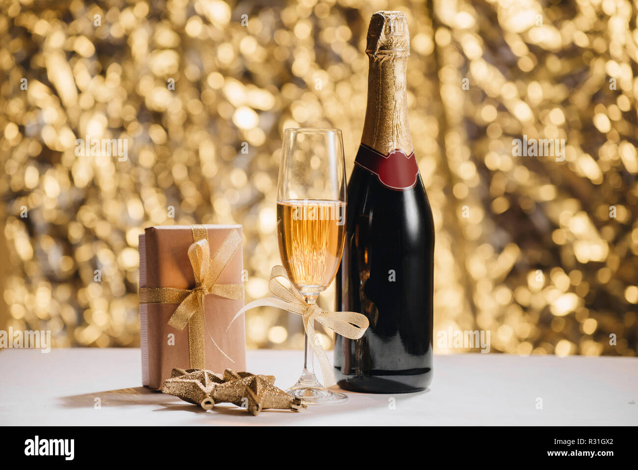 Happy new year - champagne and serpentine Stock Photo - Alamy