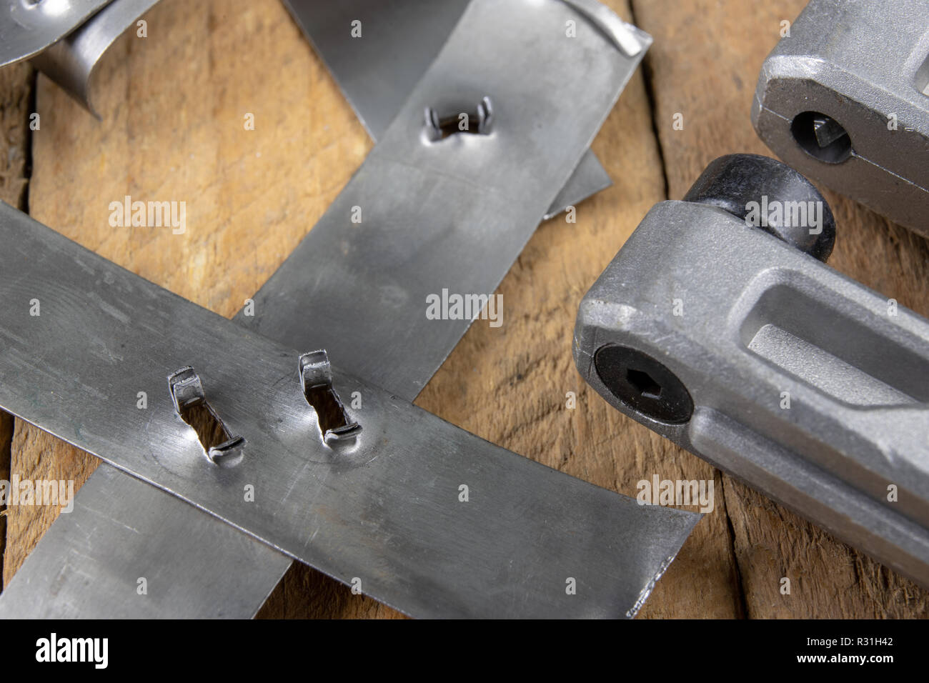 Bonding a sheet metal using a crimper. Small locksmith works in a ...