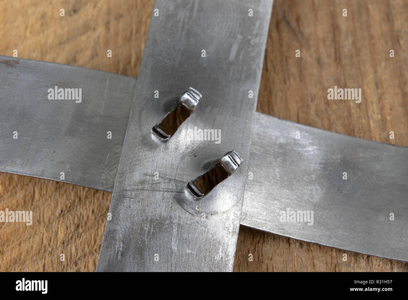 Bonding a sheet metal using a crimper. Small locksmith works in a ...