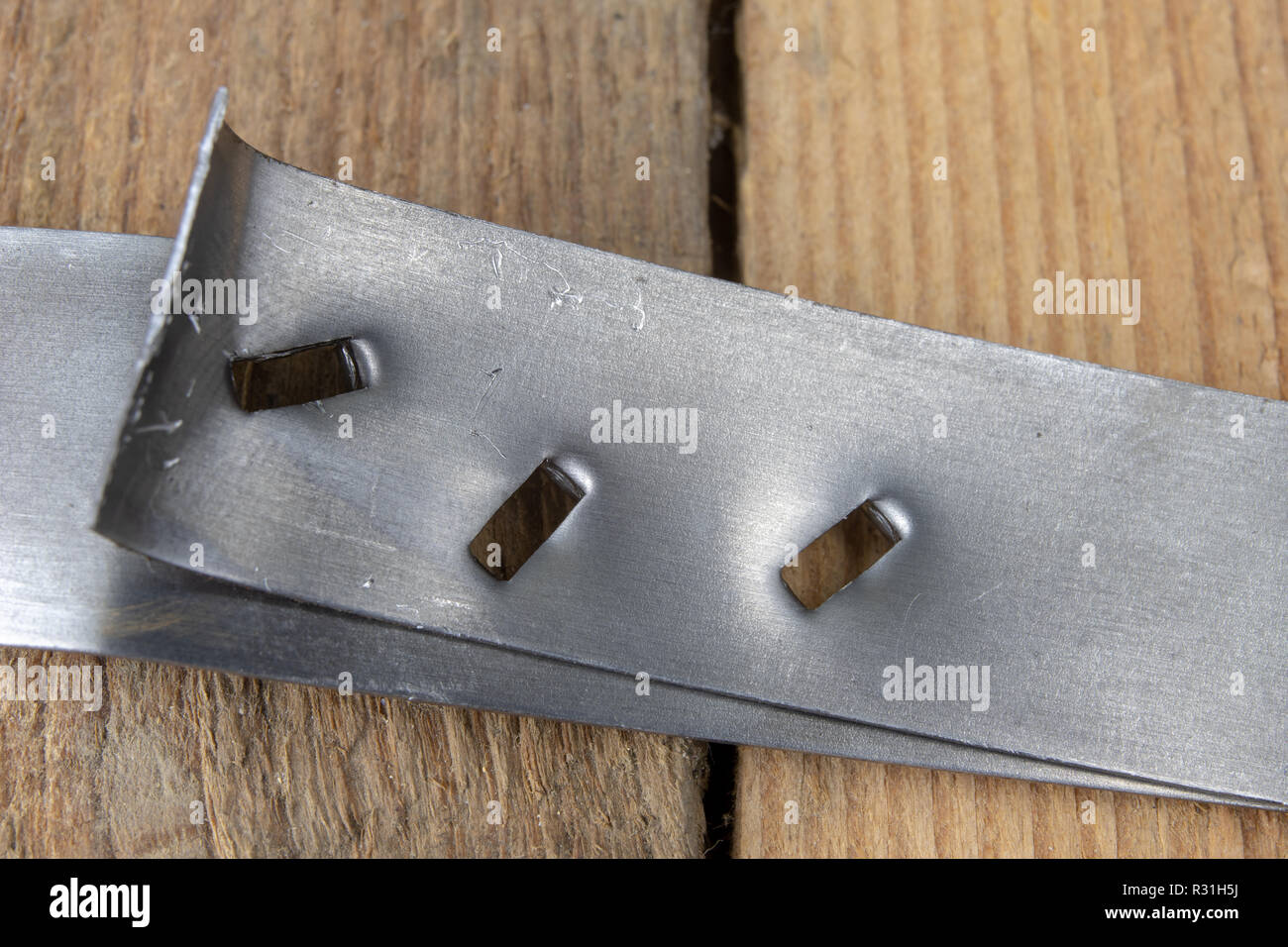 Bonding a sheet metal using a crimper. Small locksmith works in a ...