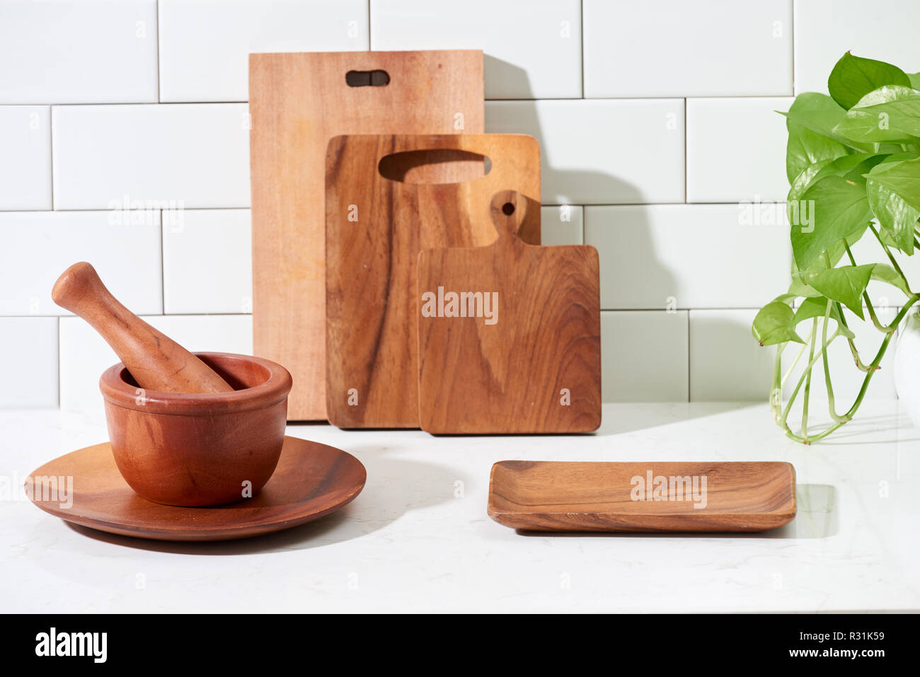 Still life with kitchen wooden utensils on white background Stock Photo ...