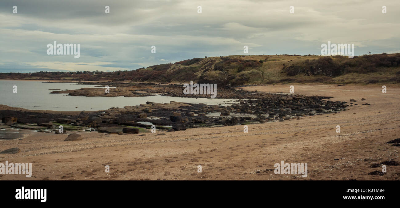 Seascape in Scotland, with horseshoe Gullane beach formed of sand and ...