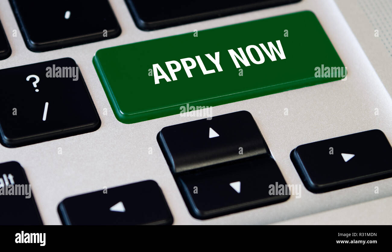 Computer notebook keyboard with Apply Now key, silver laptop with black ...