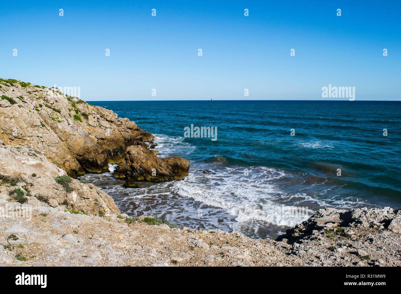 Water splash on rocky coastline, Spain Stock Photo - Alamy