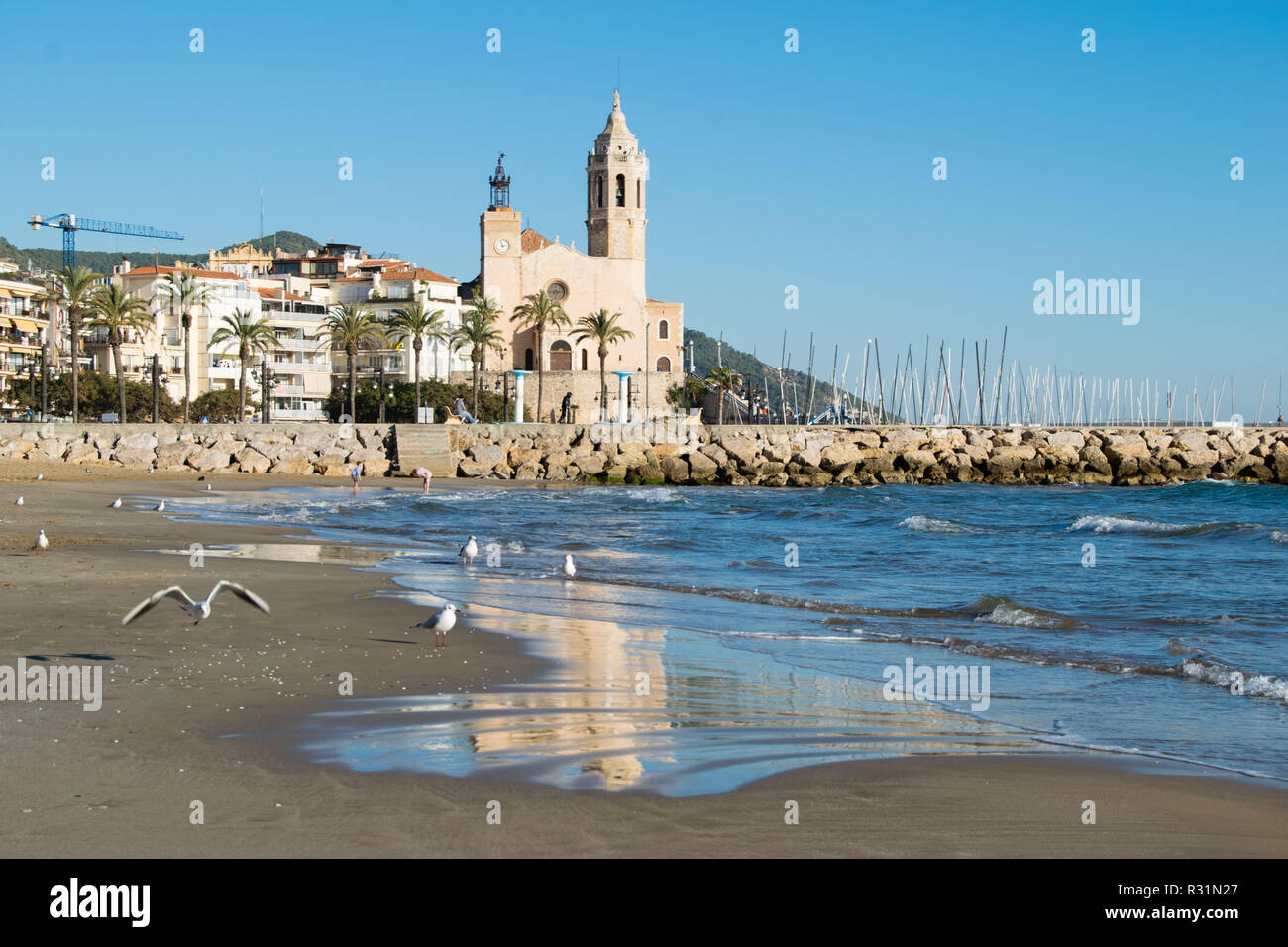 The beautiful town of Sitges with seagulls, winter Spain, Landscape of ...