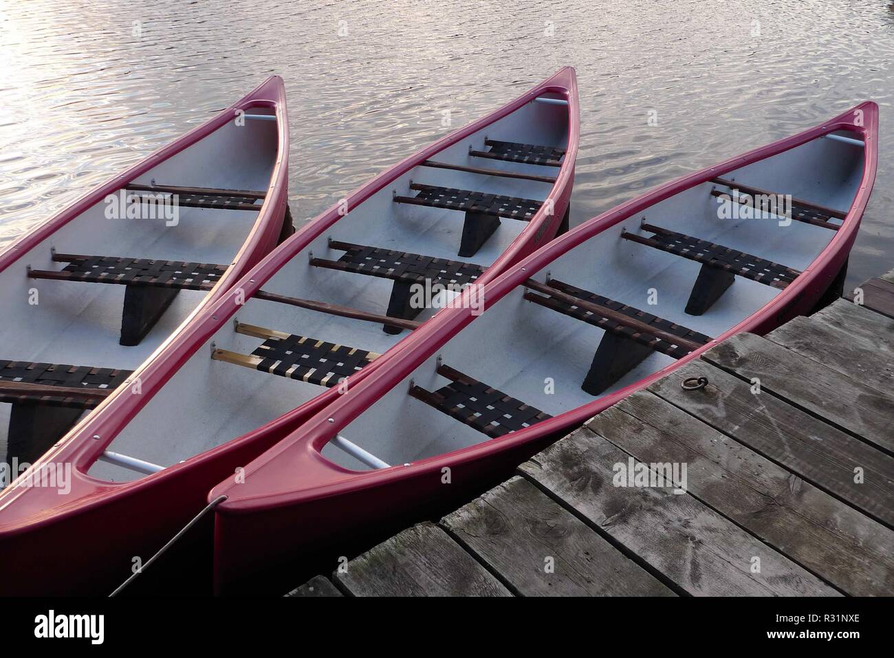 three boats at the dock Stock Photo - Alamy