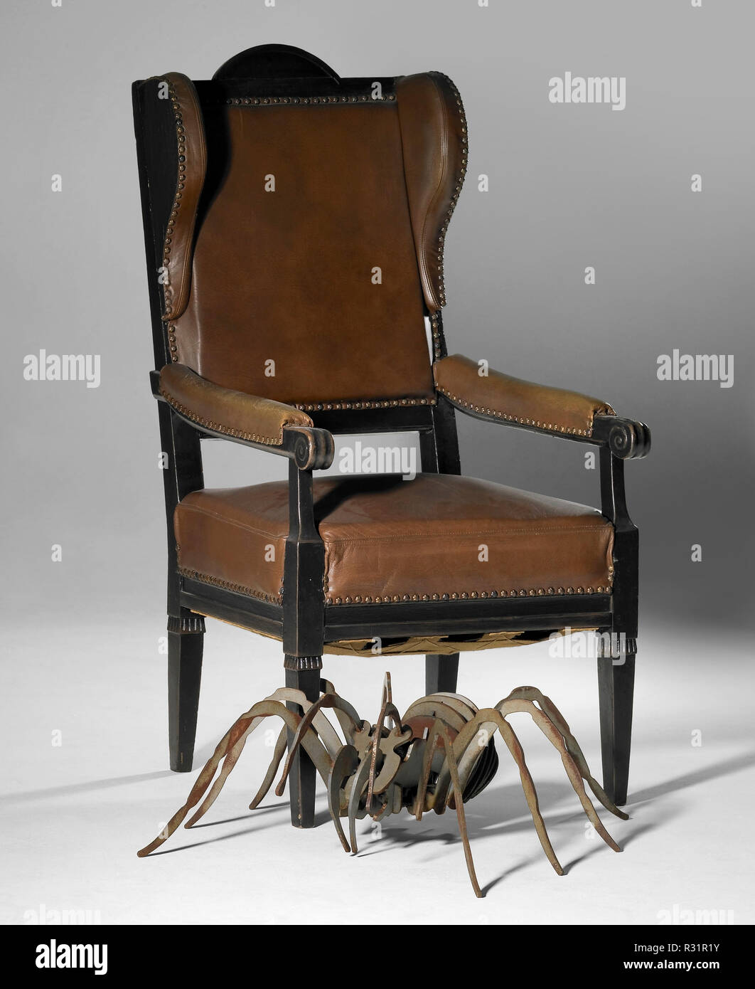 winged chair and metallic spider Stock Photo - Alamy