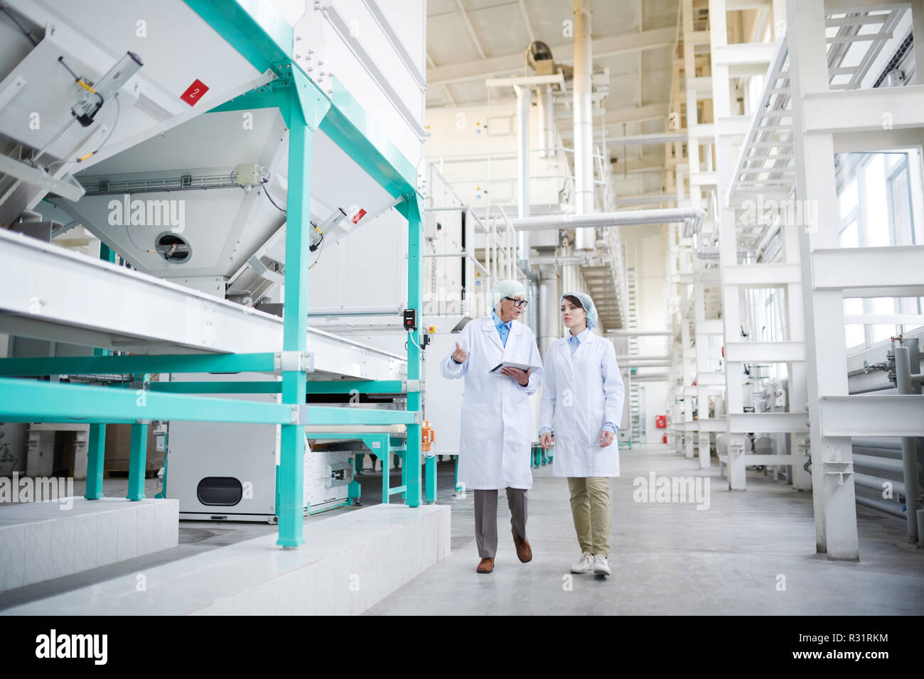 Workers at Clean Factory Stock Photo - Alamy