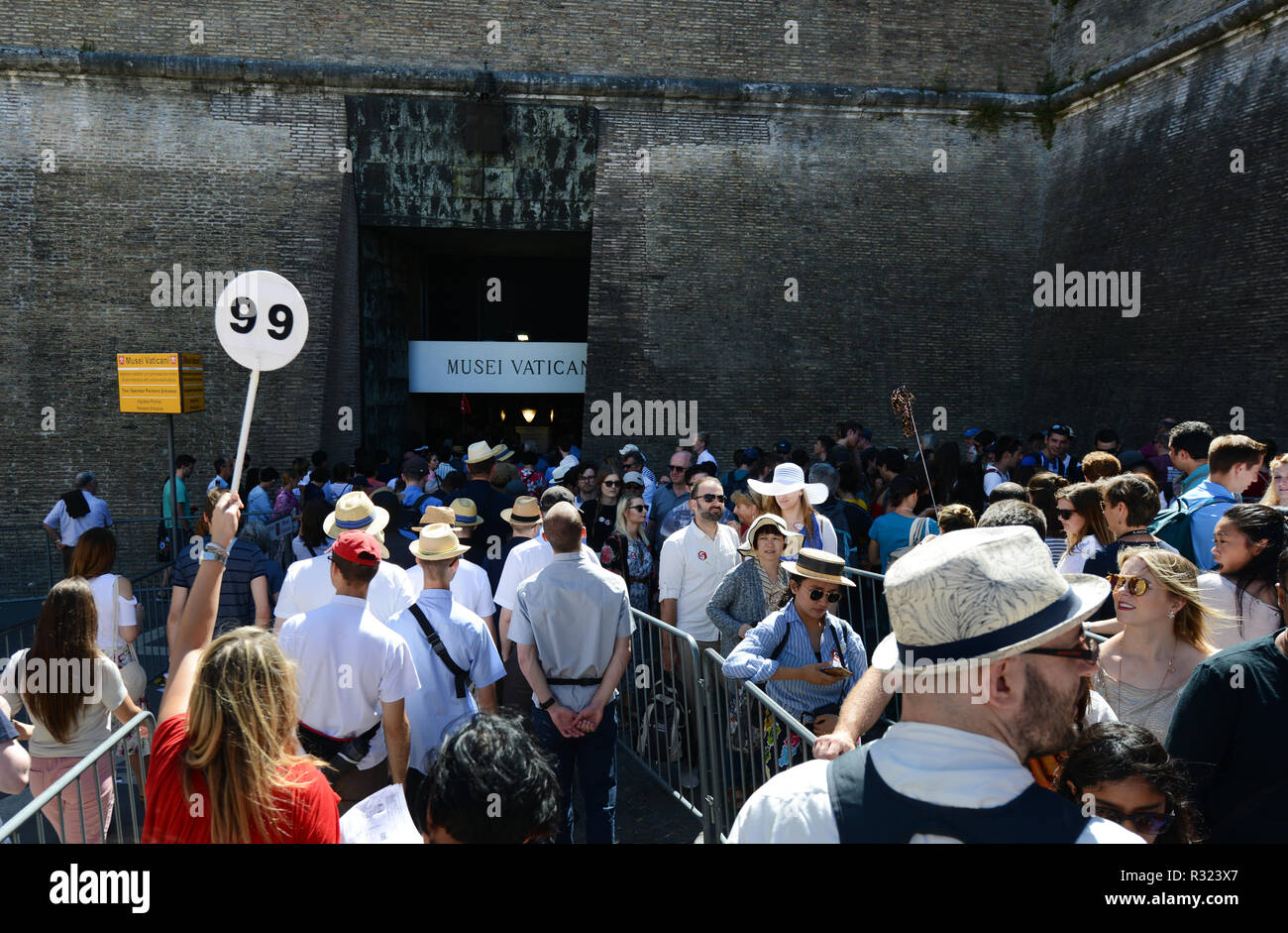 Tourist waiting in line at the entrance of the Vatican museum in the ...