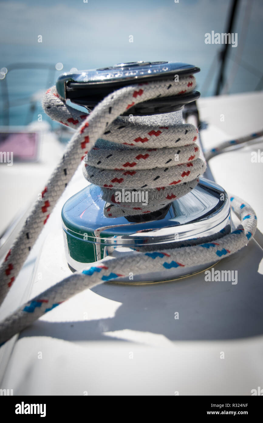 Shiny self tailing winch with triple braided line Stock Photo - Alamy