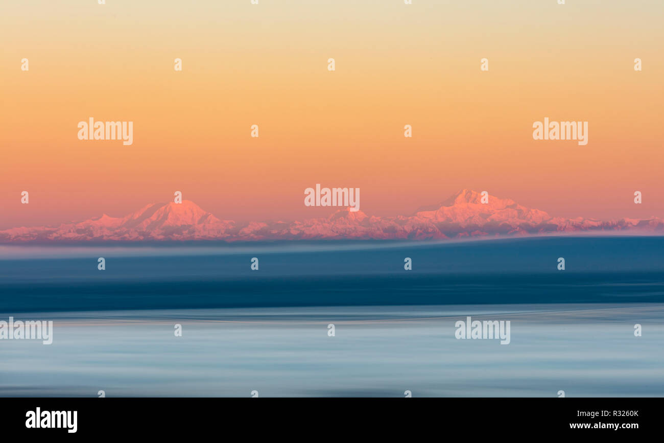 Alpenglow on Mount Foraker and Denali at sunrise in Southcentral Alaska ...
