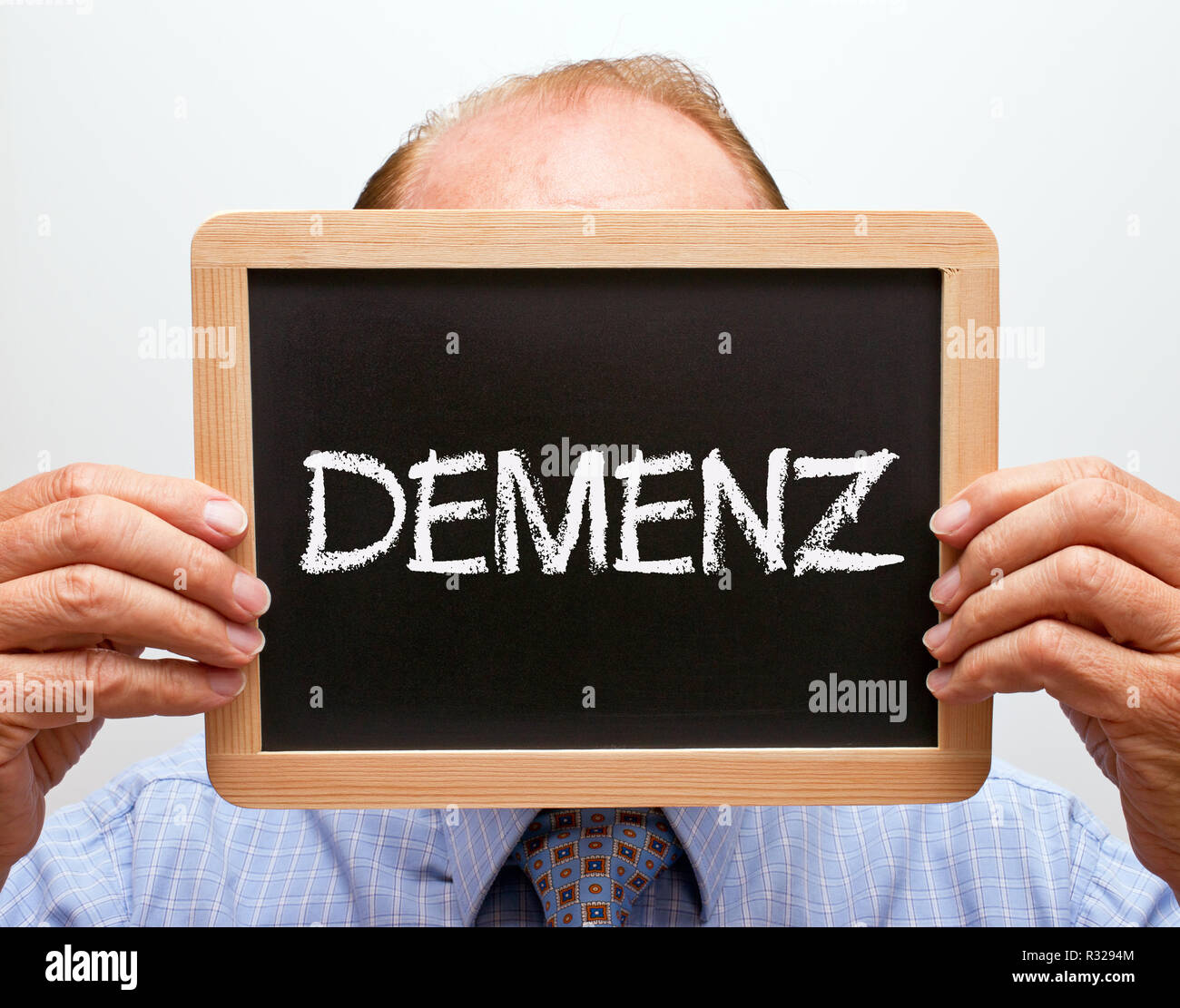 Senior and forgetful and writing hi-res stock photography and images ...