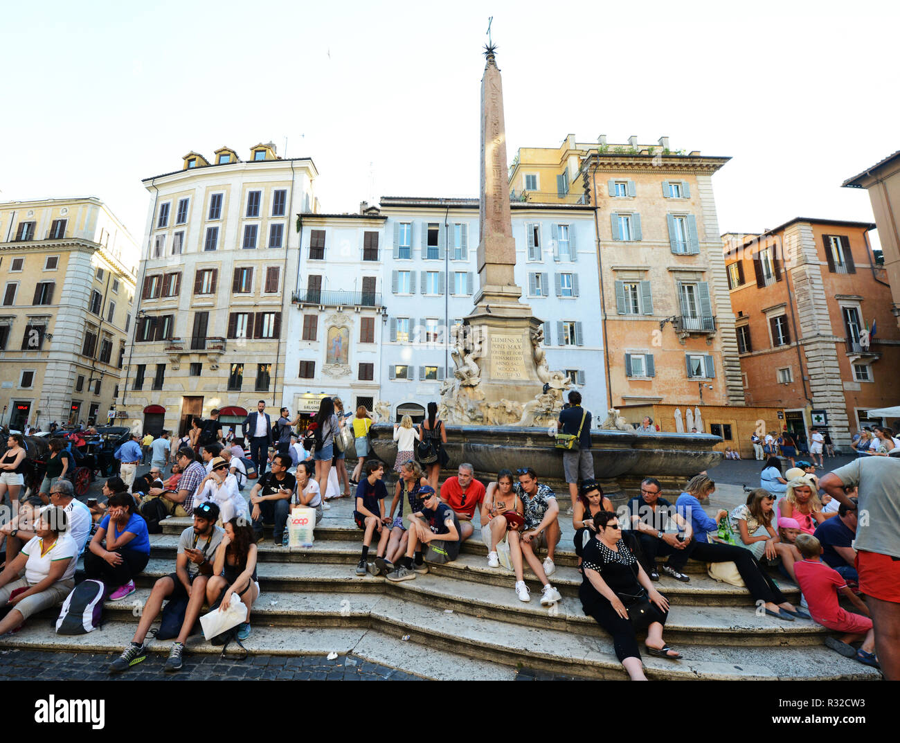 Tourist sitting by the Fontana del Pantheon at the Piazza della Rotonda ...