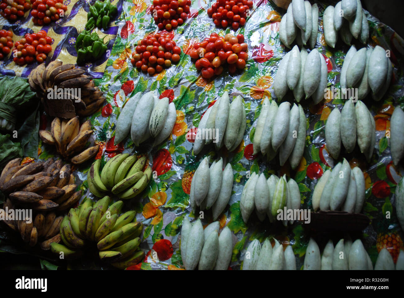 Small piles of fruit and vegetables to sell at Honiara Central Market ...