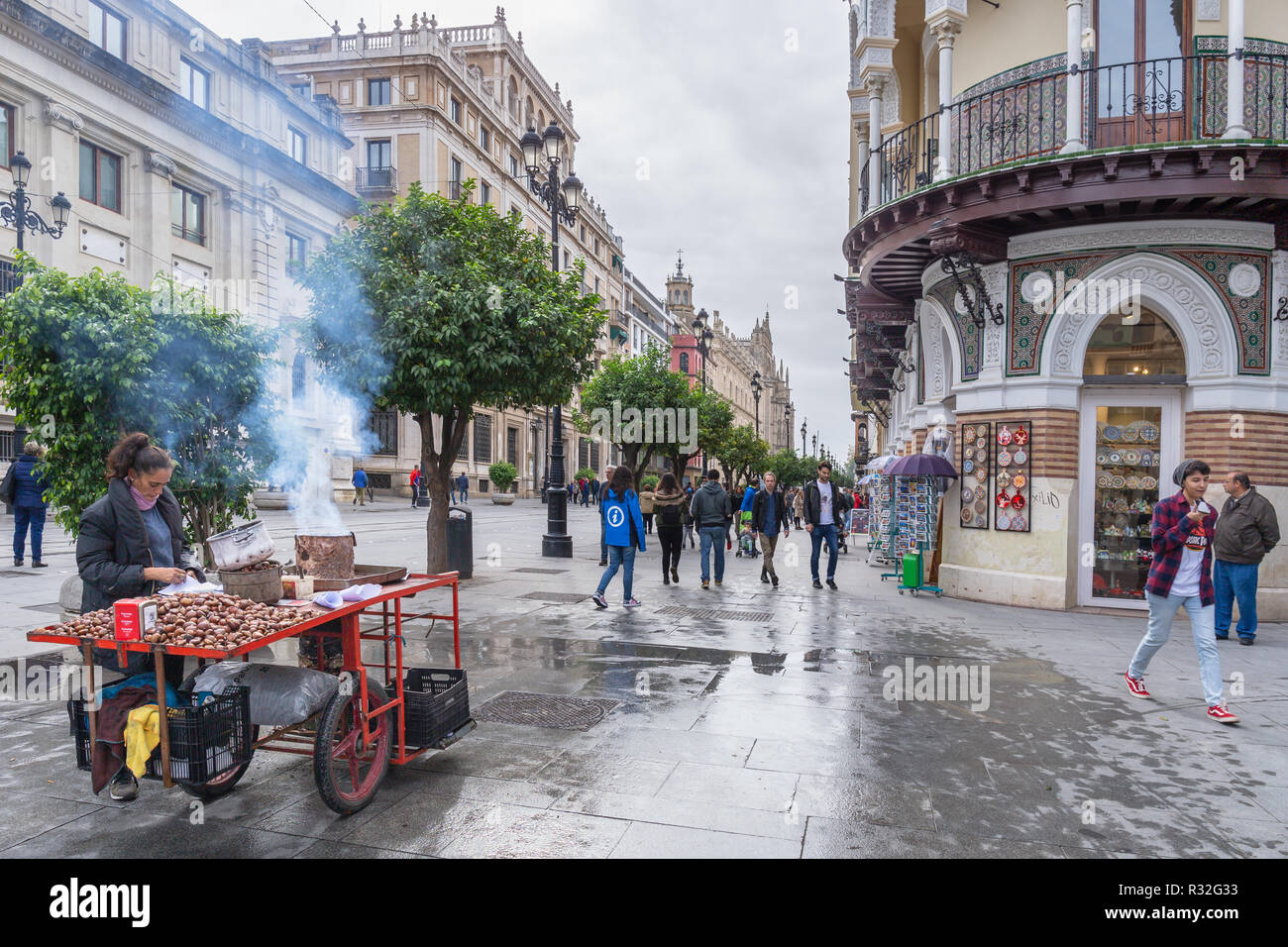 Roasted chestnut stall in Seville, Andalusia, Spain Stock Photo - Alamy