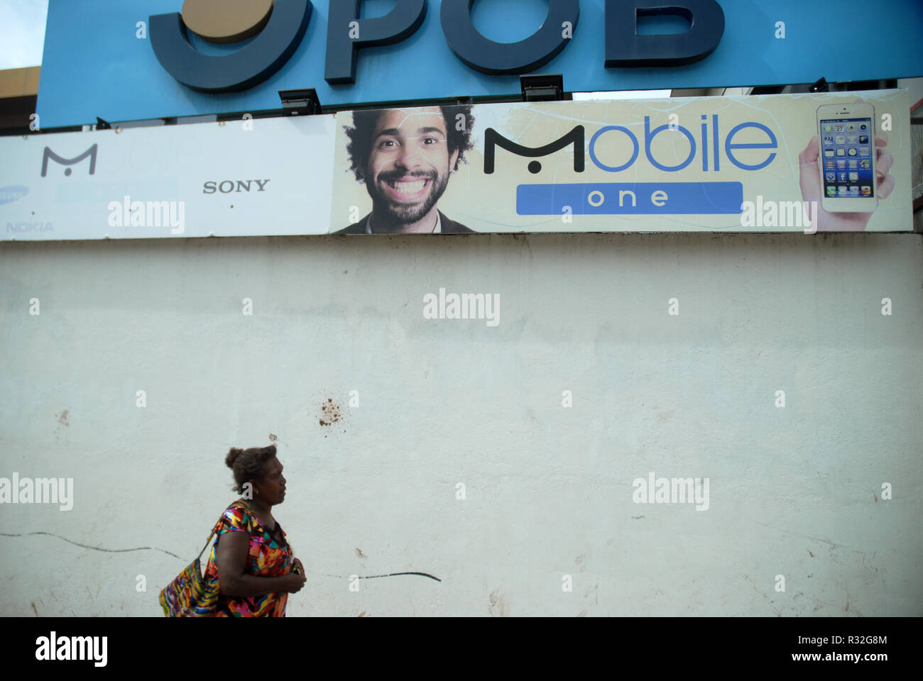 Mobile One sign, Honiara, Solomon Islands Stock Photo - Alamy