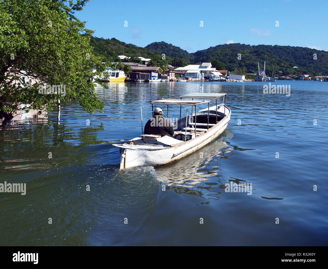 Water Taxy in the Harbour, Oak Ridge, Roatan Stock Photo - Alamy