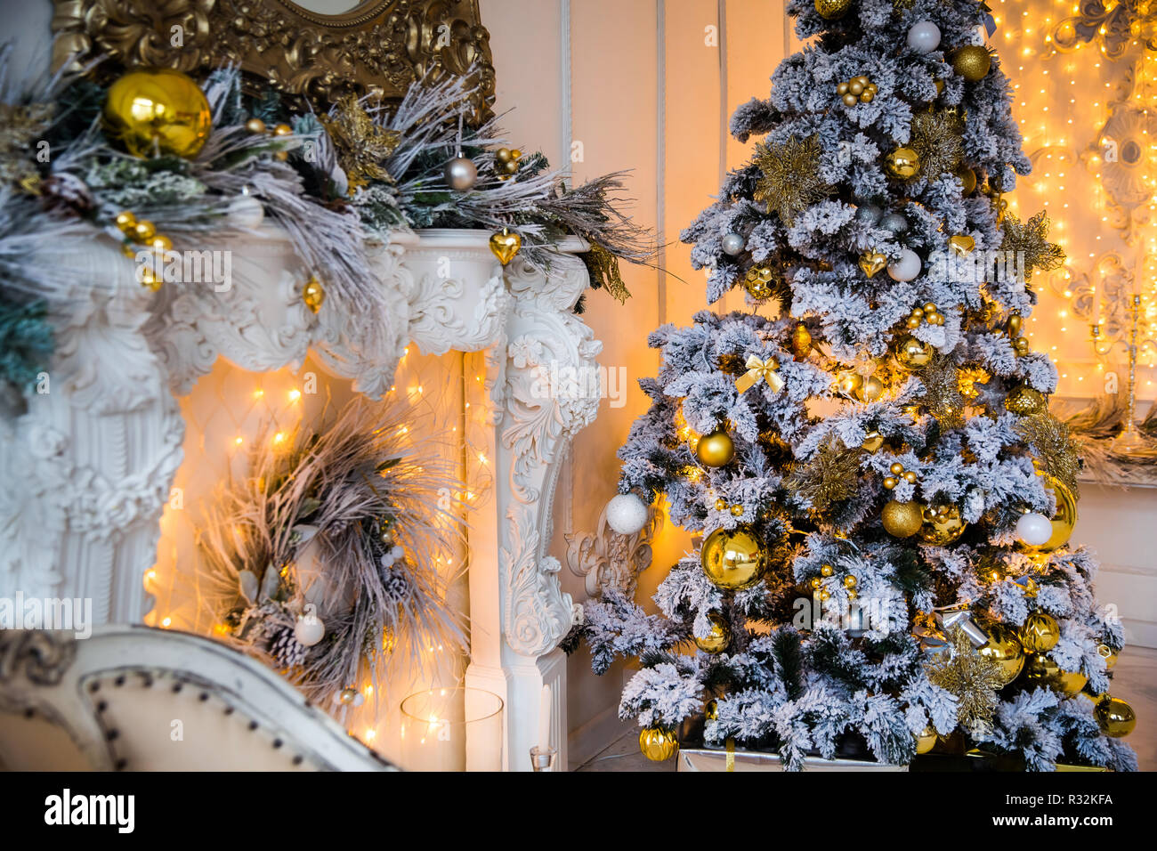 Christmas interior background with artificial fireplace and New Year ...