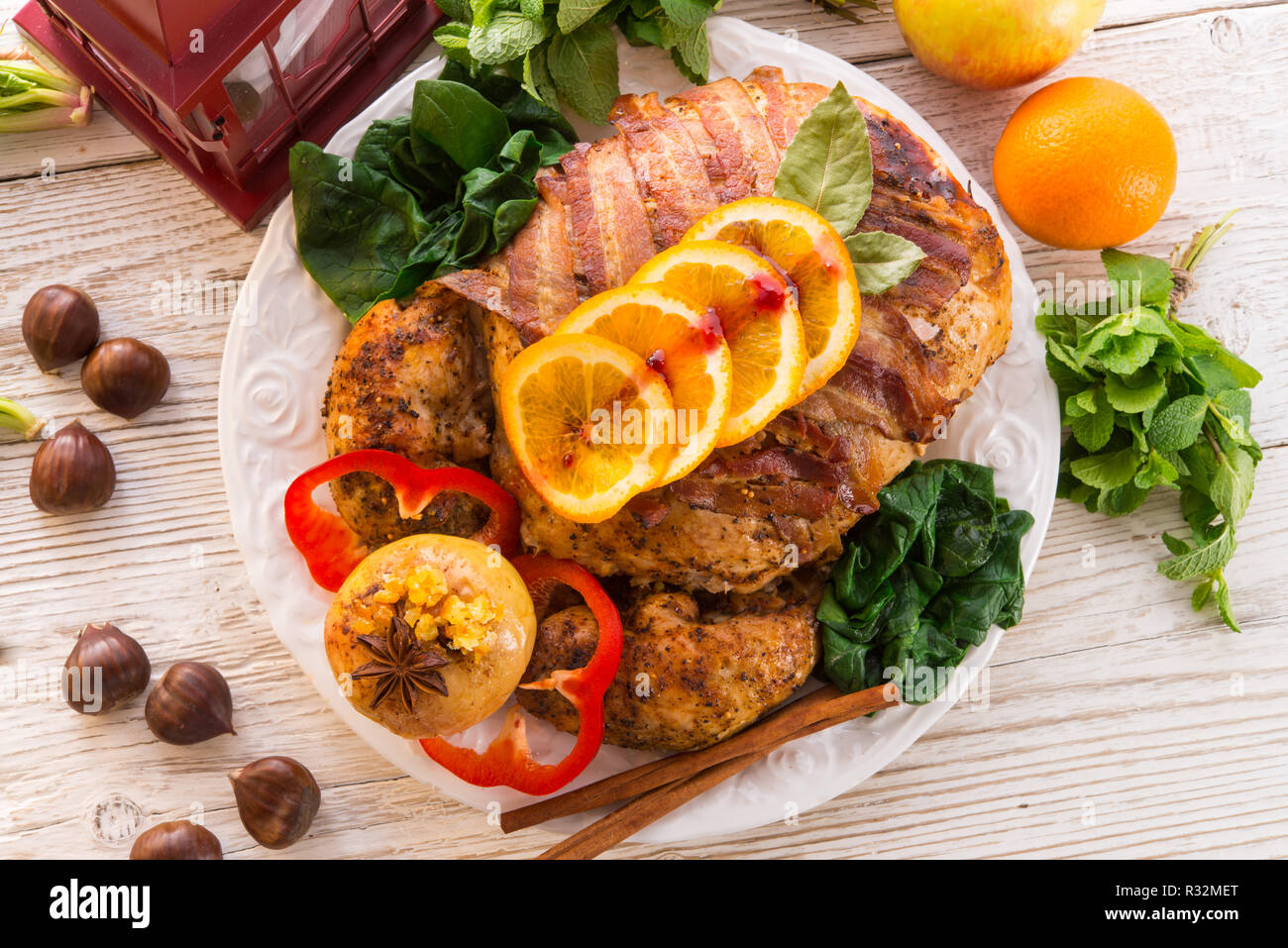 baked turkey with chestnut filling and orange Stock Photo - Alamy