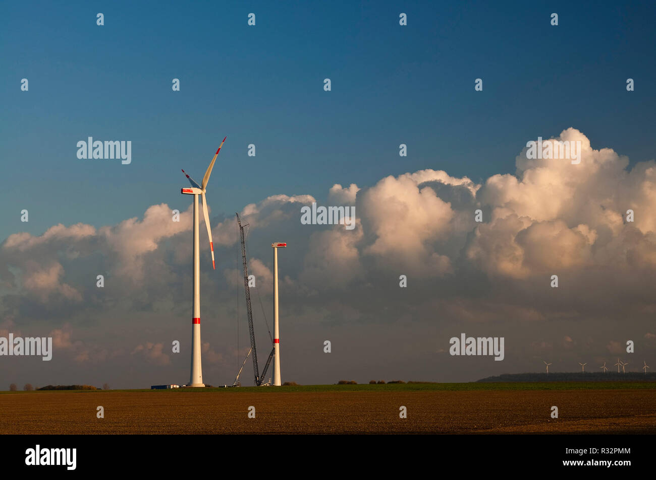 wind turbines with coal power plant in the background Stock Photo - Alamy