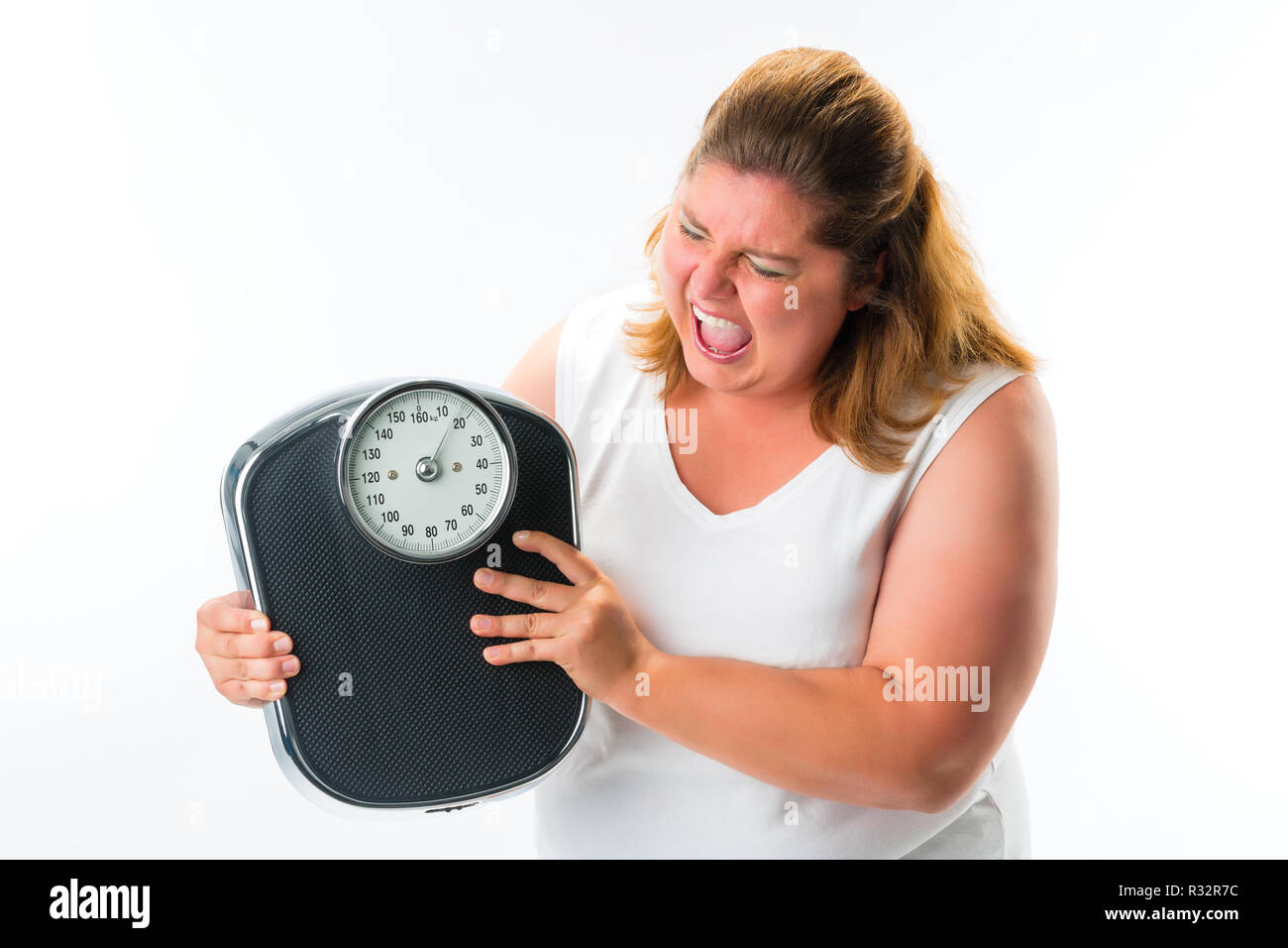Woman weight scales sad hi-res stock photography and images - Alamy