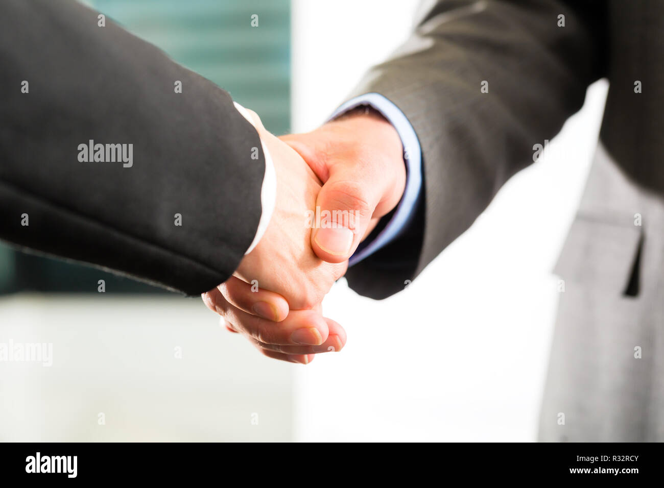 handshake in business Stock Photo - Alamy