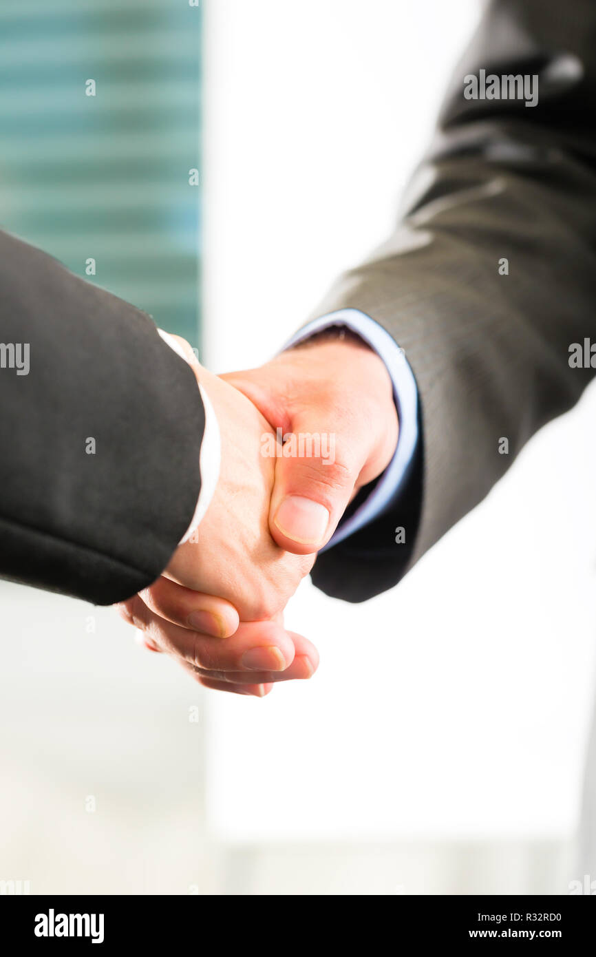 handshake in business Stock Photo - Alamy